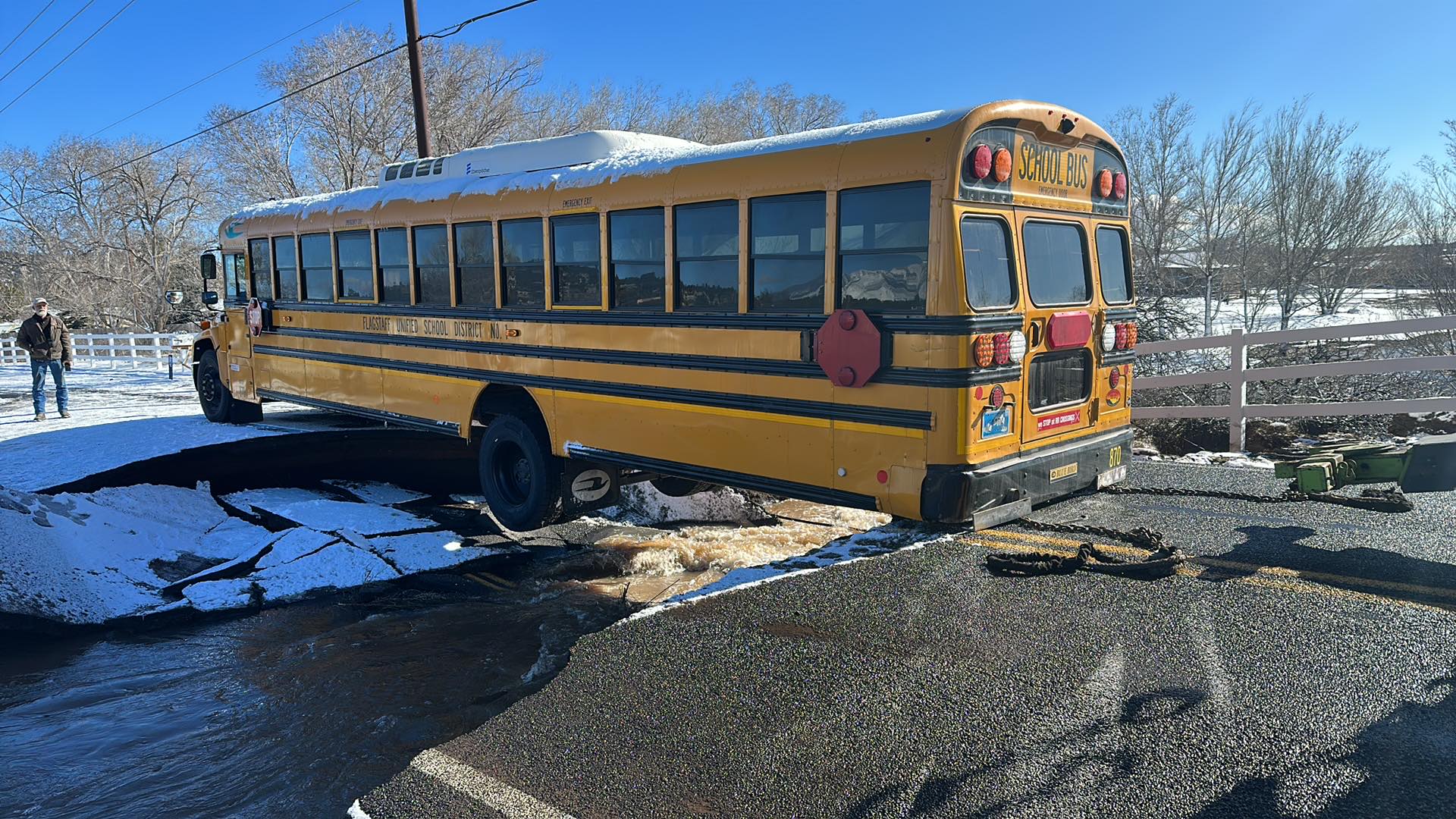 FUSD Bus Stuck In Washed Out Road In Doney Park – FlagScanner